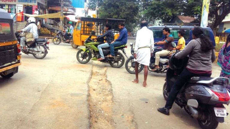 Damaged roads cause frequent mishaps at Maruthi Circle - Star of Mysore