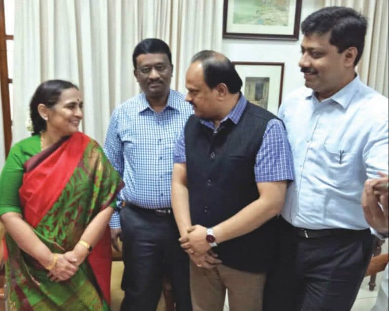 Dr. M.R. Ravi receives IAS order copy - Star of Mysore