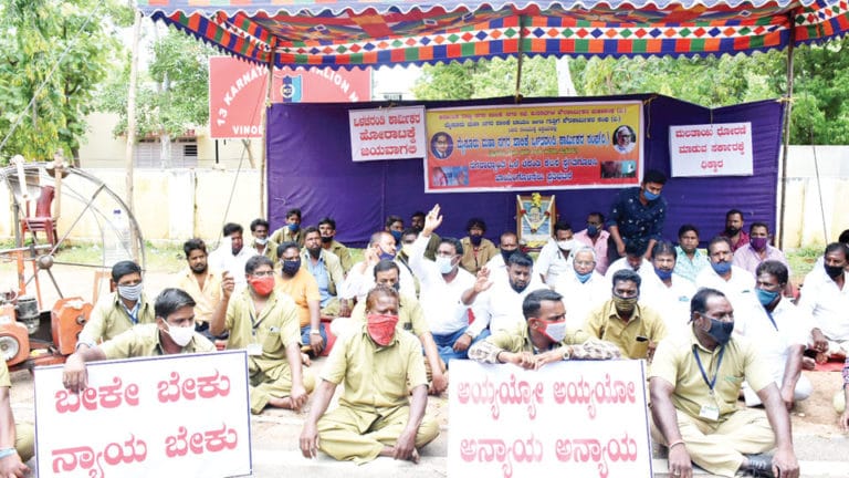UGD workers stop work, stage protest - Star of Mysore