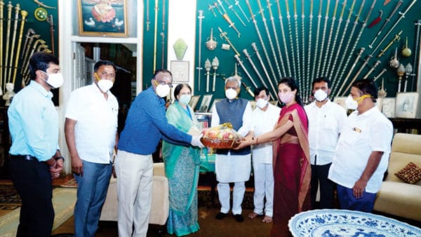 District Administration team calls on Pramoda Devi - Star of Mysore