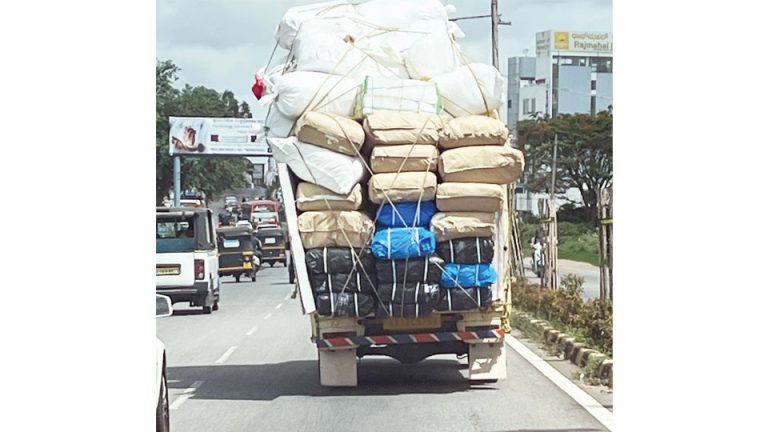Dangerously overloaded goods vehicle - Star of Mysore