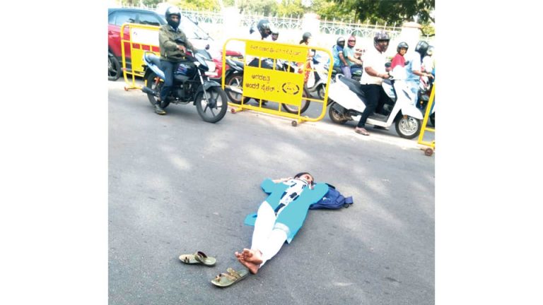Demand of Rs. 18,000 for marks cards: Girl student lies on road in ...